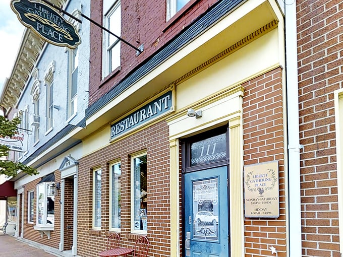 The brick facade of Liberty Gathering Place welcomes you like an old friend, complete with charming blue door and red bicycle parked outside.