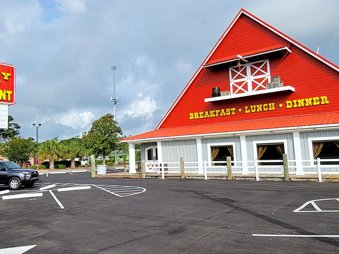 The iconic red barn roof isn't just architectural showmanship—it's a beacon of breakfast hope standing proud against the South Carolina sky.