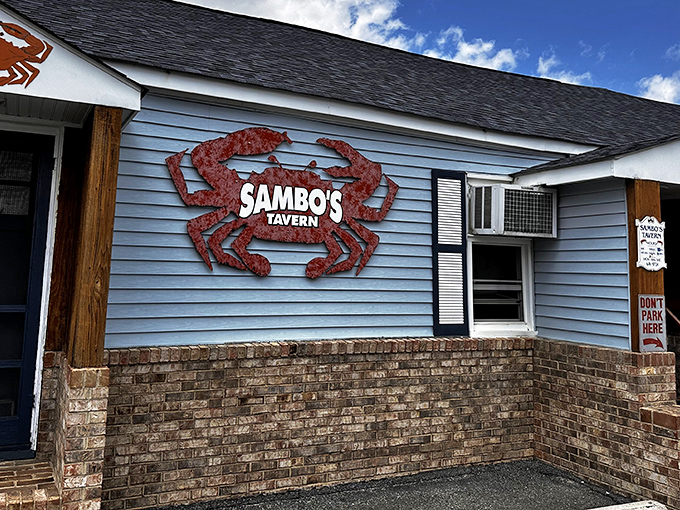 The iconic red crab sign against blue clapboard isn't just decoration&mdash;it's a beacon of deliciousness calling to hungry seafood lovers across Delaware.