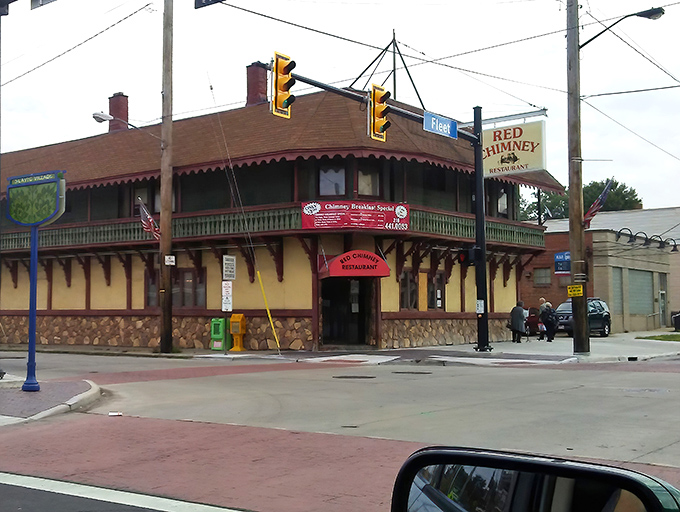 The iconic corner building with its distinctive red awning stands like a time capsule of comfort in Cleveland's Collinwood neighborhood.