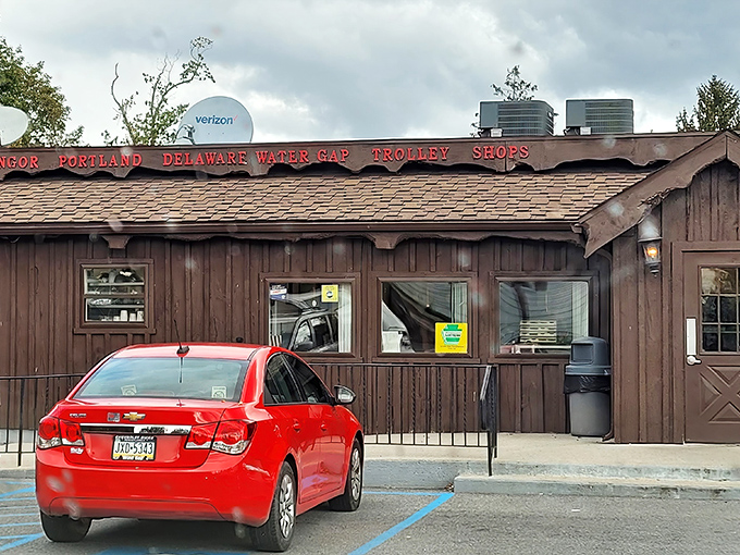 The rustic wooden exterior of Trolley Shops Restaurant stands as a time capsule of Pennsylvania's trolley-line history, inviting hungry travelers with its no-nonsense charm.