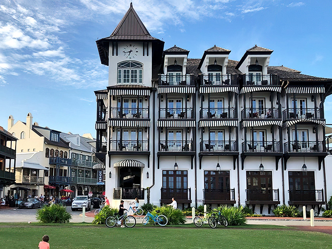 The iconic clock tower building stands as Rosemary Beach's architectural crown jewel, where bicycles outnumber cars and balconies beckon with Gulf views.