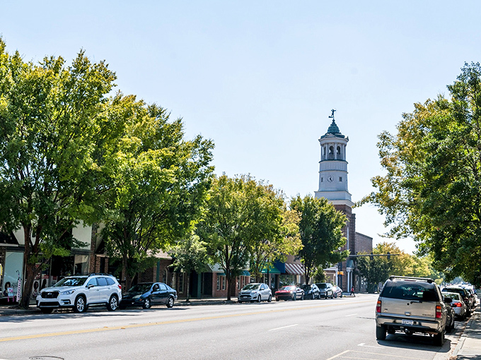 Broad Street beckons with its classic small-town charm, where that iconic clock tower stands like Camden's own personal timekeeper against a perfect Carolina blue sky.