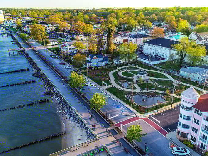 North Beach from above looks like someone arranged a perfect coastal town diorama &ndash; complete with boardwalk, bay views, and that circular park that practically begs for a Sunday stroll.