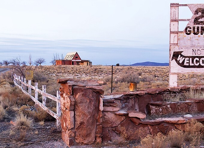 Welcome signs never looked so beautifully weathered &ndash; this desert greeting has stories etched in every crack.