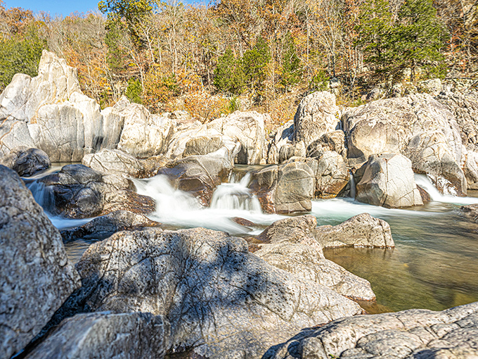 Nature's perfect waterslide! Ancient volcanic rock formations create a geological playground where water dances through channels carved over billions of years.
