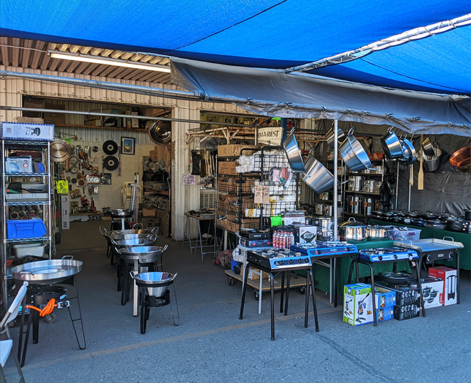 Blue tarps provide welcome shade from the Arizona sun as vendors display everything from cookware to electronics. Treasure hunting begins here!
