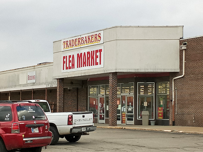 The unassuming exterior of Traderbakers beckons with its bold red lettering, promising treasures within like a carnival barker inviting you to step right up.
