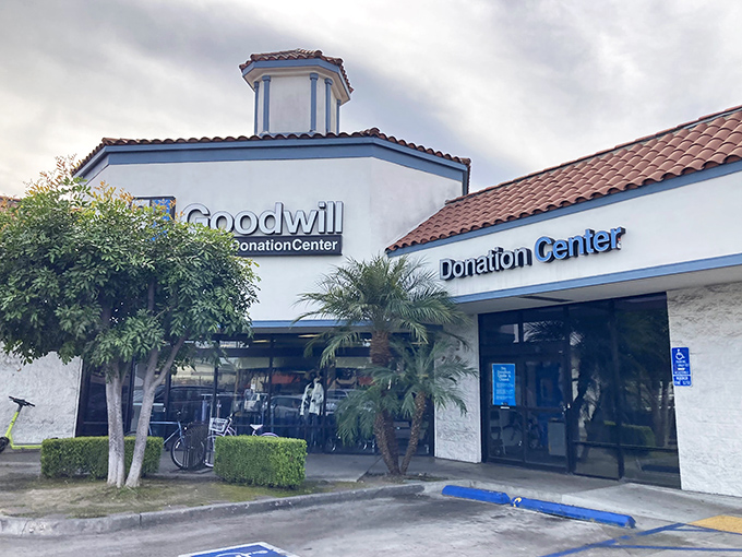 The Spanish-style architecture with its signature terracotta roof makes this Goodwill look more like a boutique resort than a thrift store paradise.