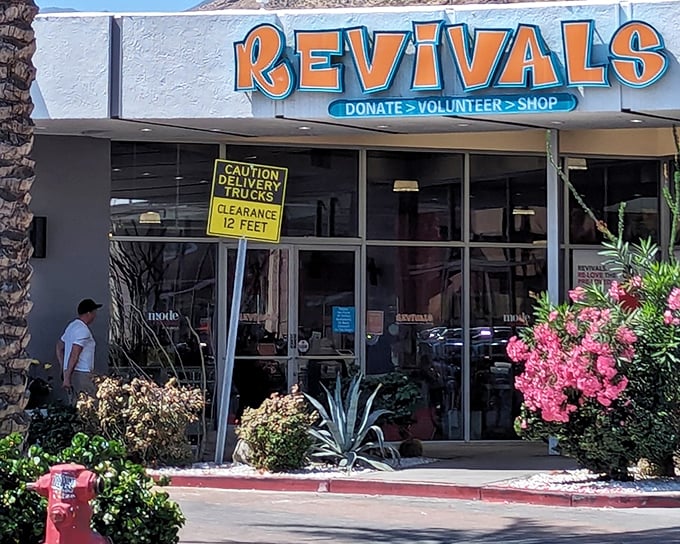 The desert sun highlights Revivals' bold orange signage, where "Donate > Volunteer > Shop" isn't just a slogan&mdash;it's a lifestyle philosophy for treasure hunters.