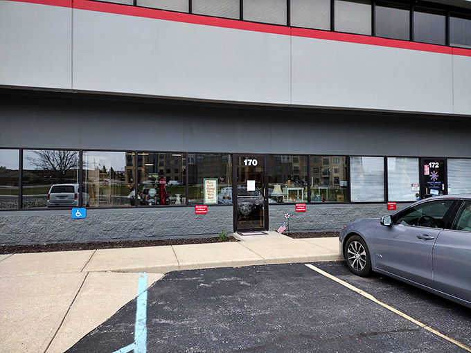 The unassuming exterior of Antique Emporium in Carmel hides a wonderland of treasures within, like finding Narnia behind a department store facade.