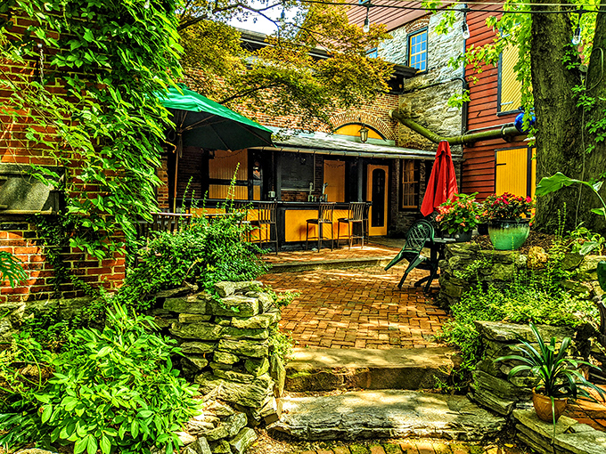 The courtyard at Bube's feels like stumbling into a secret garden where time forgot to tick forward. Brick pathways and lush greenery create an oasis of Victorian charm.