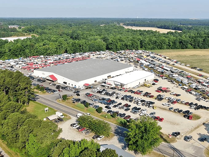 The red-trimmed entrance to Brightleaf Market stands like a beacon of bargain possibilities under Carolina's blue skies. Adventure awaits inside!