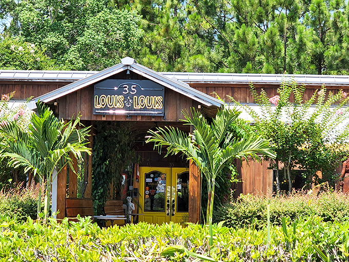 Like a tropical cabin of culinary delights, Louis Louis beckons with its rustic wooden charm and those unmistakable bright yellow doors that practically shout "good times ahead!"