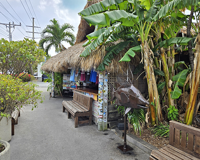 Thatched roofs and tropical foliage welcome you to this hidden gem, where paradise begins with a wooden bench and ends with unforgettable seafood.