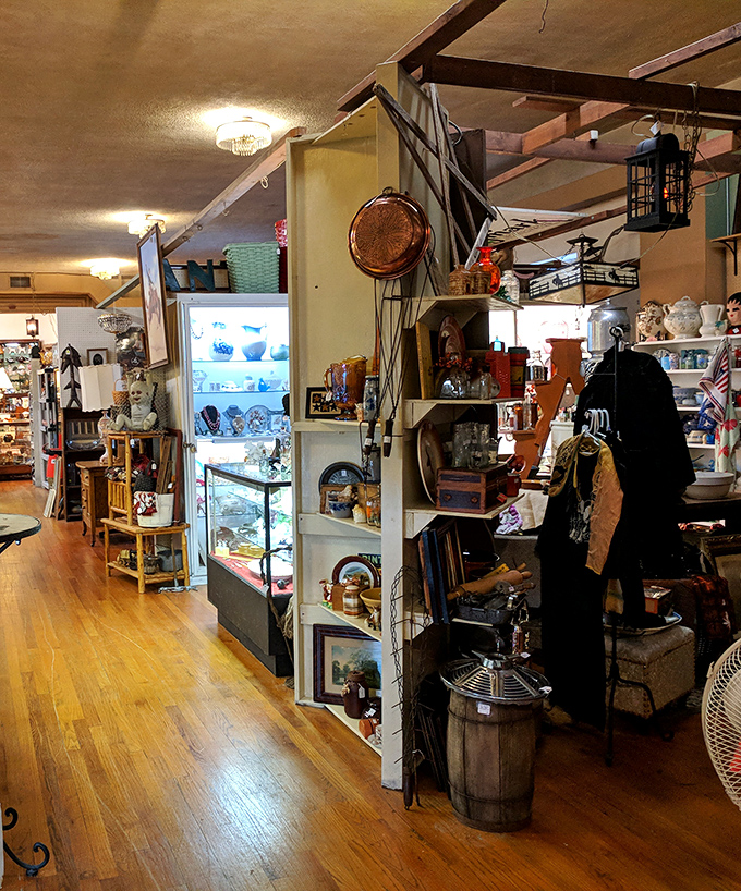 The attic of your dreams! Wooden beams frame this treasure-filled space where vintage collectibles await discovery around every corner.