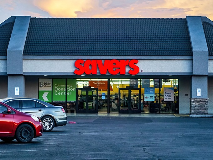 The iconic red Savers sign beckons like a lighthouse for bargain hunters, promising treasures within that won't break the bank.