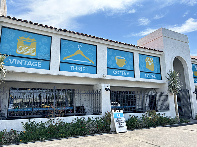 The Spanish-style exterior with its vibrant blue window panels promises treasures inside &ndash; like a stylish friend who always delivers on their promises.