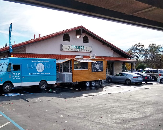 The unassuming exterior of Trends Vintage Marketplace hides a wonderland of treasures inside, like a book you can't judge by its cover.