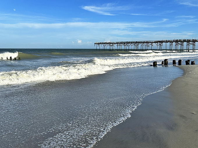 Nature's grand finale at Freeman Park Beach, where sunset paints the sky in impossible hues and seabirds photobomb your perfect moment.
