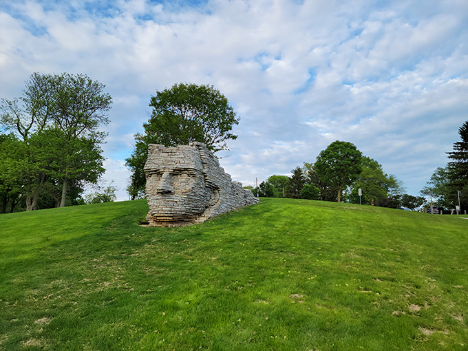 The iconic Chief Leatherlips monument watches over Scioto Park like a stone sentinel with the world's most impressive poker face. 