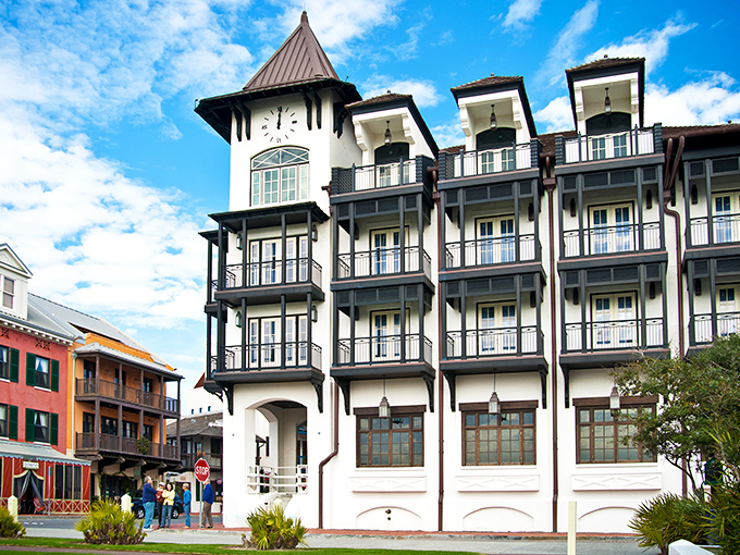 This clock tower building looks like it escaped from a European postcard and decided to vacation permanently in Florida.