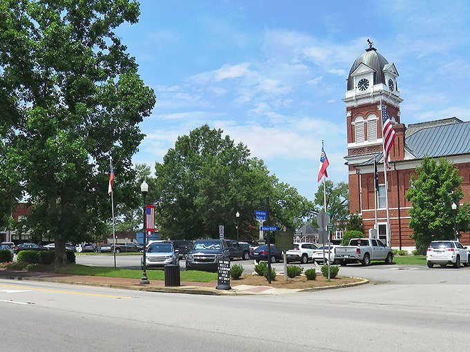 Historic storefronts line Sandersville's main street, their brick facades standing like sentinels of small-town charm against the bright Georgia sky.