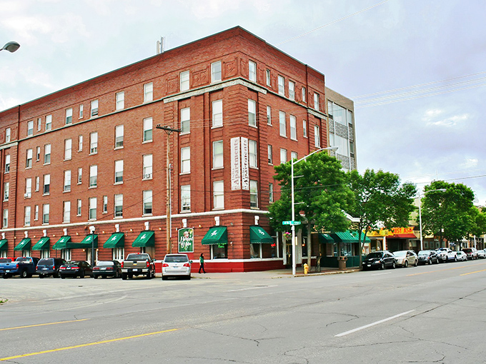 Escanaba's iconic teal water tower stands sentinel over tree-lined streets and modest homes&mdash;small-town America with waterfront views that million-dollar suburbs would envy.