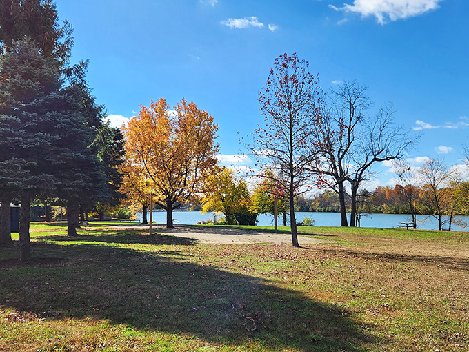 Fall's fashion show at Madison Lake creates a perfect reflection in the calm waters, nature's own Instagram filter working overtime.