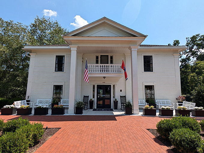 The grand white facade of Miss Mary Bobo's stands like a Southern belle waiting to welcome you home. Those rocking chairs aren't just for show!