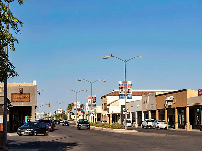 Main Street Brawley stretches toward the horizon under that impossibly blue desert sky, where small-town charm meets agricultural might.