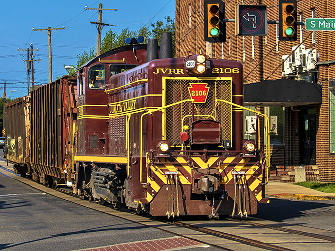 Lewistown's historic downtown square showcases classic Americana with its stately courthouse, towering monument, and church spires framed by rolling Appalachian foothills.