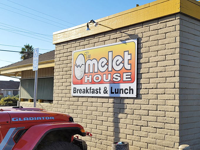 The bright yellow trim of Omelet House beckons like a breakfast lighthouse in Stockton, promising eggy treasures within those humble walls.