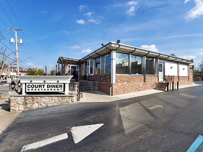 The classic brick and stone exterior of Court Diner stands like a beacon of comfort food promise in Media, Pennsylvania.