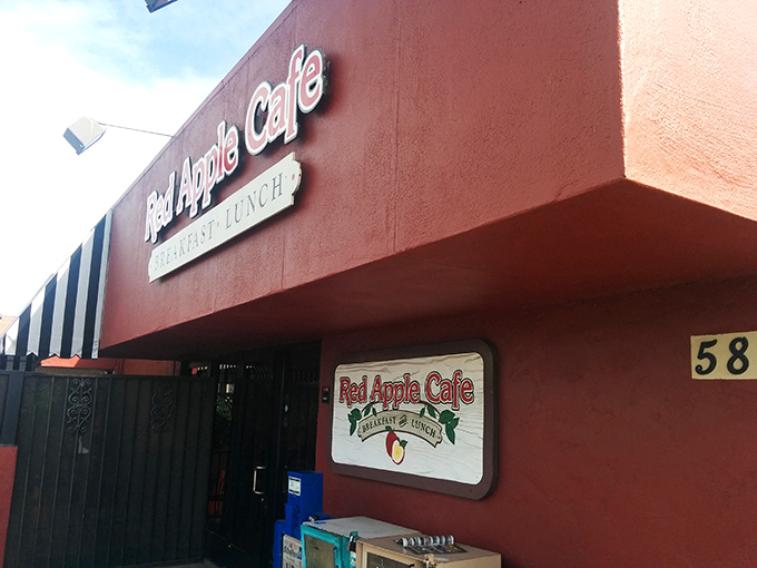 The unassuming exterior of Red Apple Cafe proves once again that culinary treasures often hide behind modest fa&ccedil;ades. That red-striped awning is basically a superhero cape for breakfast lovers.