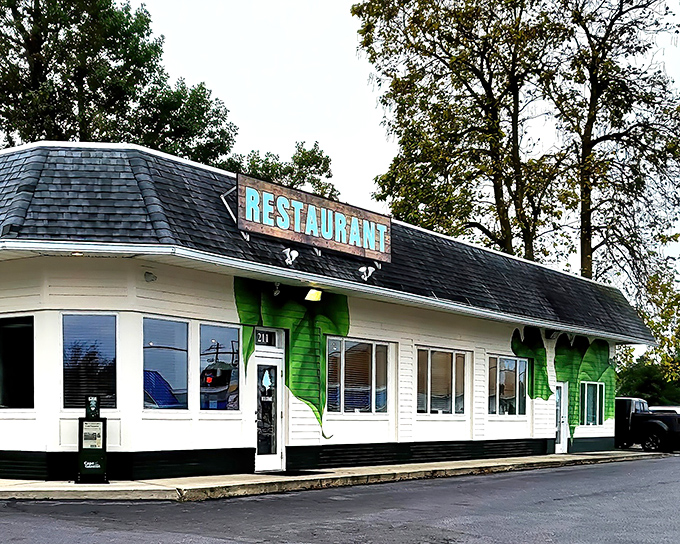 The unassuming exterior of The Backyard in Milton might fool you, but that green vine detail hints at the fresh culinary adventures waiting inside.