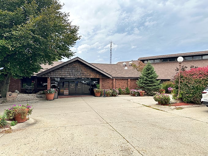 The rustic wooden shingles and warm brick exterior welcome hungry travelers like an old friend waiting with open arms.