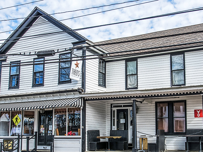Classic Eastern Shore charm in white clapboard. Theo's unassuming exterior hides culinary treasures within, like finding a pearl in Chesapeake Bay.