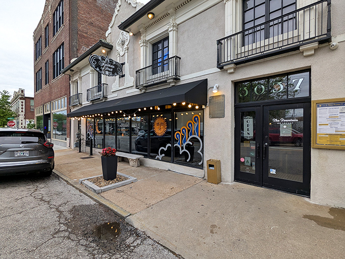 The stately Art Deco fa&ccedil;ade of The Fountain on Locust stands as a culinary beacon on St. Louis' historic Locust Street, promising retro delights within.