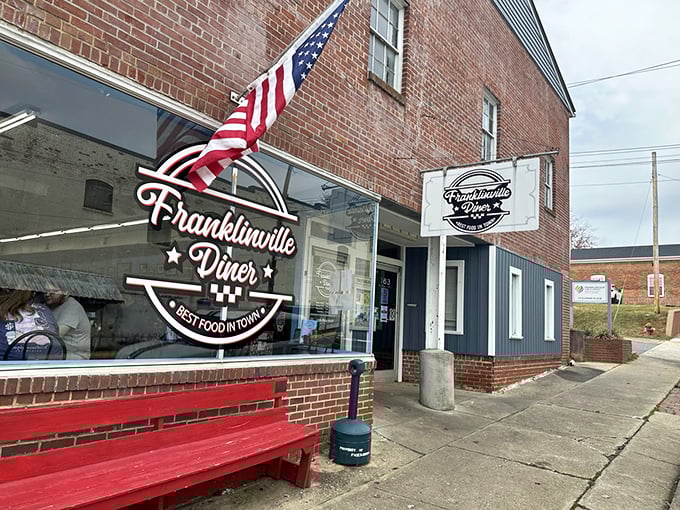 Classic Americana at its finest – a vintage blue pickup parked outside the brick-fronted Franklinville Diner, where time slows down and appetites ramp up.