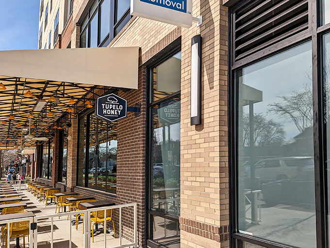 The brick exterior of Tupelo Honey beckons like a Southern lighthouse in Upper Arlington, promising comfort food that'll hug your soul from the inside out.