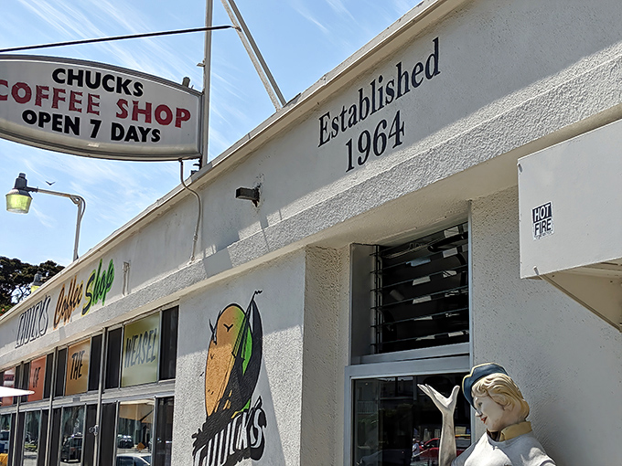 The unassuming exterior of Chuck's Coffee Shop stands as a time capsule on Ocean Boulevard, promising breakfast magic since 1964.