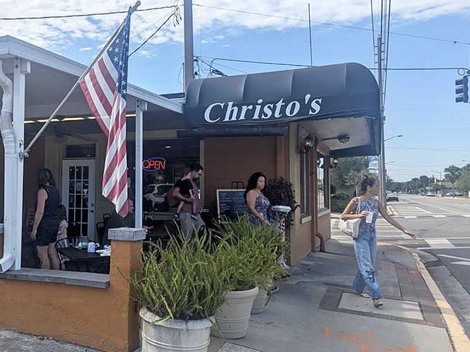 The unassuming orange exterior of Christo's Caf&eacute; stands like a beacon of breakfast hope on Edgewater Drive, palm trees standing guard over this Orlando treasure.
