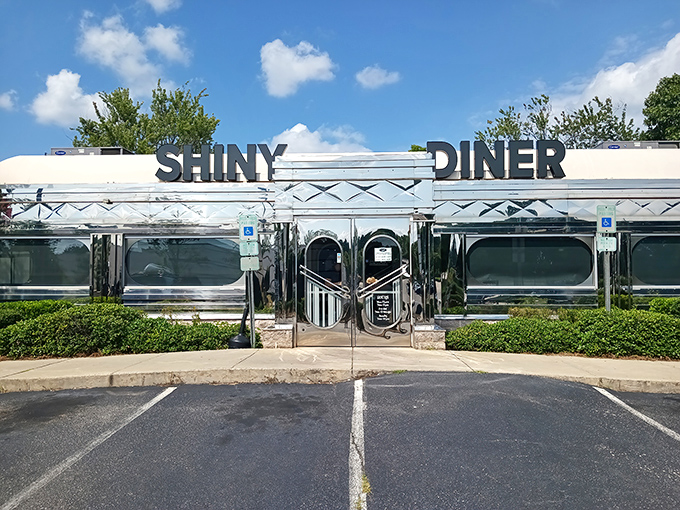 Like a chrome time machine parked on Buck Jones Road, The Shiny Diner's gleaming exterior promises nostalgic delights before you even step inside.