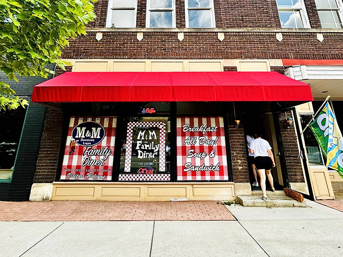 That iconic red awning isn't just a sunshade—it's a beacon of breakfast hope for hungry travelers navigating downtown Logan's brick-lined streets.
