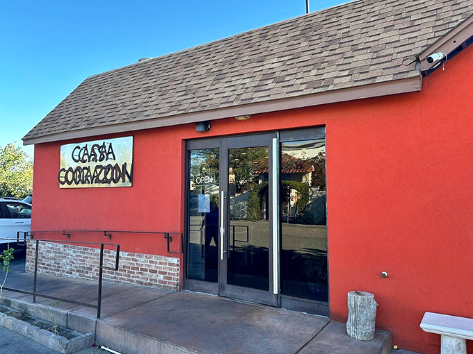 The coral-colored exterior of Casa Corazon glows like a sunset against the Phoenix sky, beckoning hungry travelers with its vibrant promise of authentic flavors.