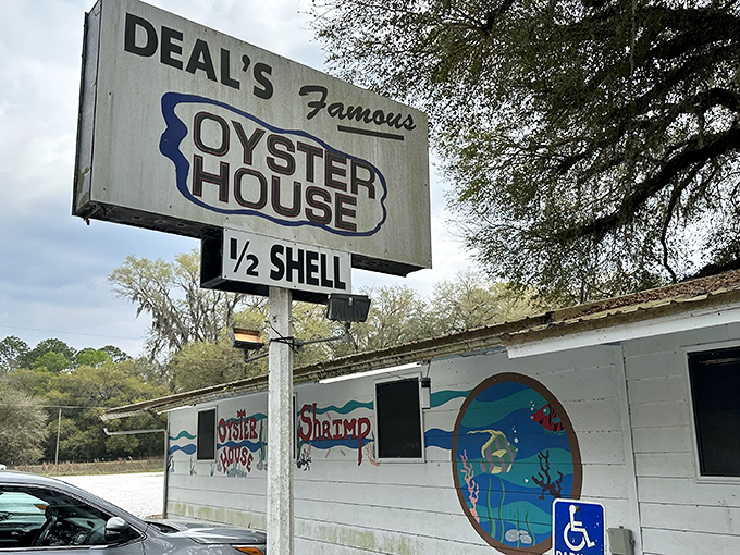 This weathered sign has welcomed hungry seafood lovers longer than most smartphones have existed.