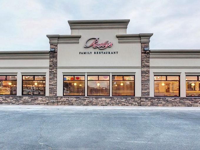 Rudy's welcoming stone facade stands like a breakfast beacon in Harrington, promising comfort food treasures within those large windows.