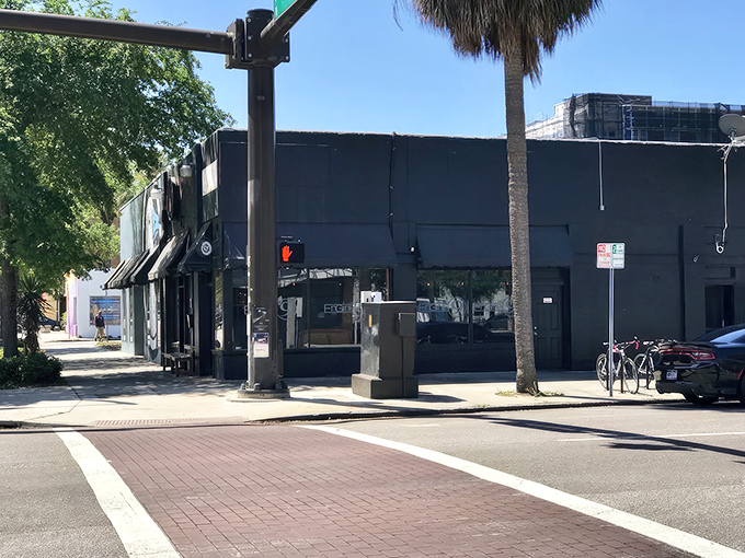 The unassuming exterior of Engine No. 9 hides a burger paradise within. That iconic red "9" logo is like a beacon for hungry St. Pete locals.