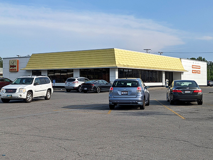 That iconic yellow roof and cheerful signage isn't just architecture—it's a beacon of burger bliss calling you home to Lima.